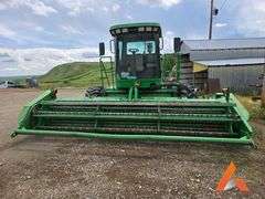 2005 John Deere 4895 Swather w/ 16' JD 895 header - Ascent Auction