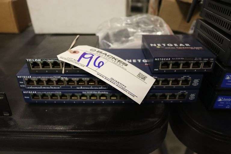 All to go - Netgear switch boxes - Backes Commercial Auctioneers
