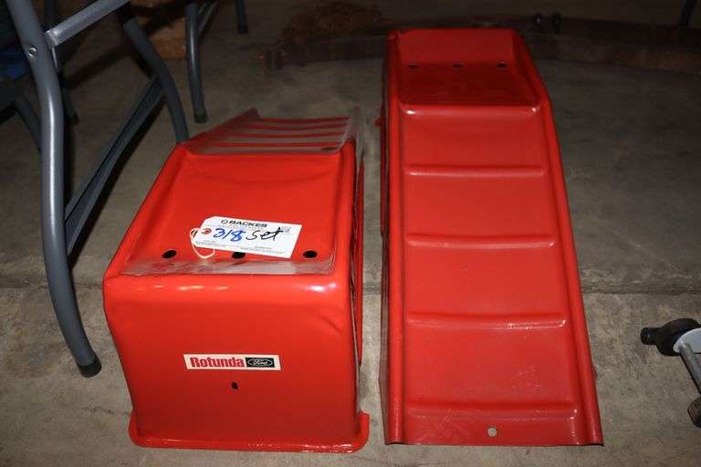 Set of Rotunda Ford 34" red metal car ramps - Backes Commercial Auctioneers