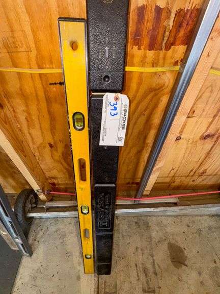 Johnson 48" level with hard case - Backes Commercial Auctioneers