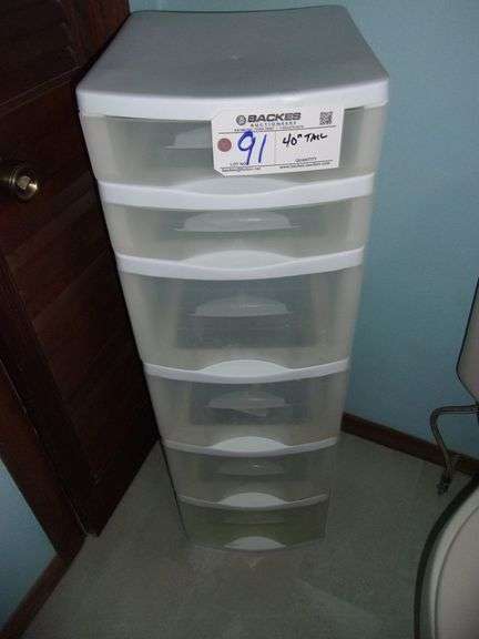 40" tall plastic storage container - Backes Commercial Auctioneers