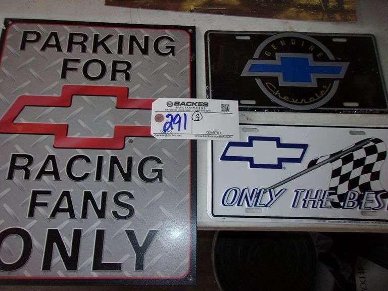 Chevy sign and license plates - Backes Commercial Auctioneers