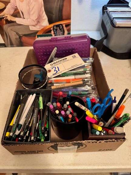 Box of pens and pencils - Backes Commercial Auctioneers