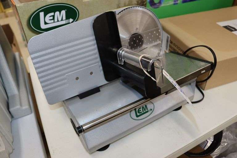 Lem 7.5" electric slicer with box - Backes Commercial Auctioneers