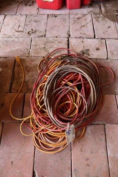 All to go - assorted extension cords - Backes Commercial Auctioneers