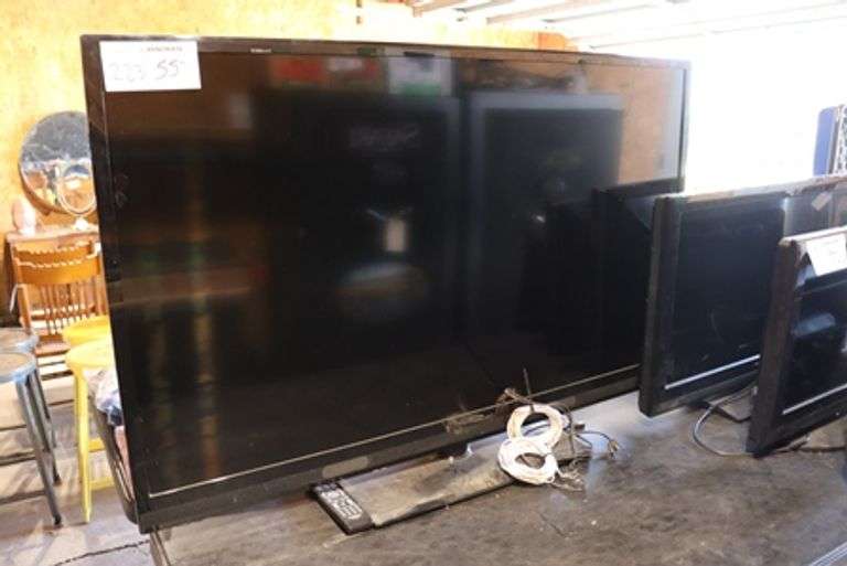 55" Insignia TV with stand mount and remote - Backes Commercial Auctioneers
