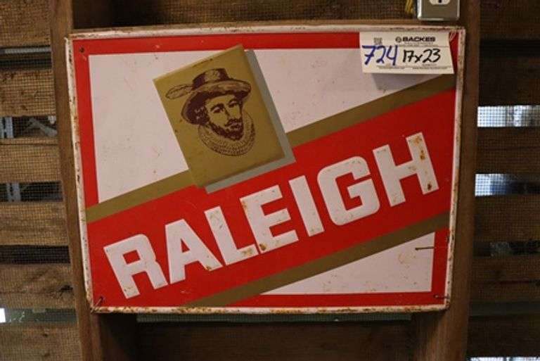 17" x 23" Raleigh metal sign - Backes Commercial Auctioneers