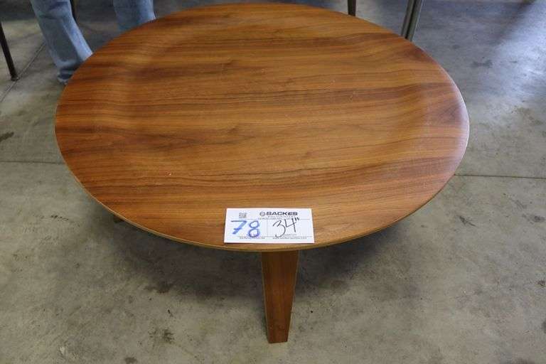 34" round wood laminate coffee table - Backes Commercial Auctioneers