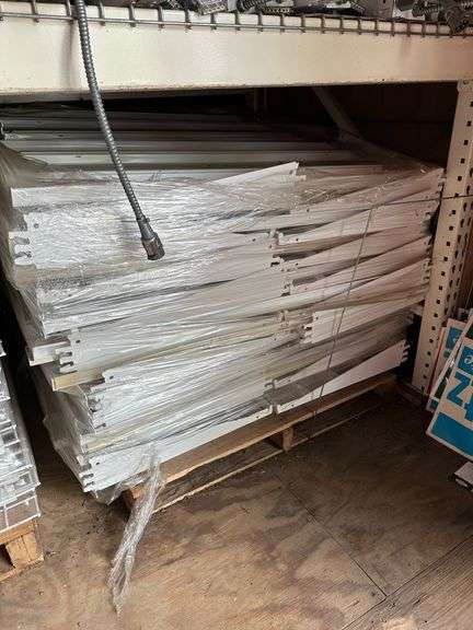 Large lot to go - 8 pallets plus of Lozier white shelving, uprights ...