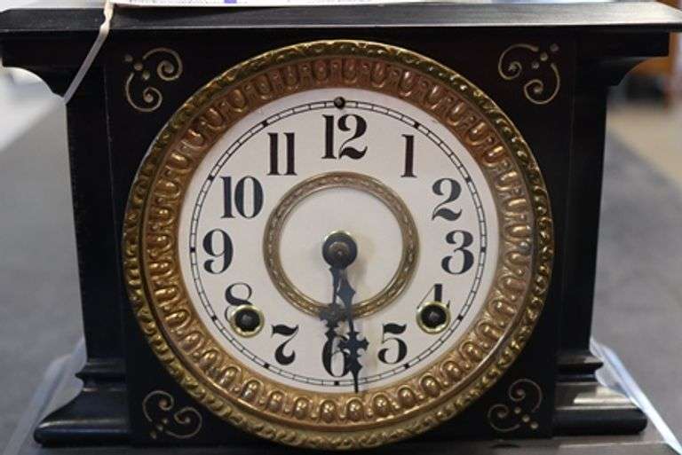 10" x 11" Cast iron Ansonia mantle clock - Backes Commercial Auctioneers