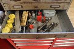 10" x 16" x 16" 4 drawer counter top cabinet with assorted bits ...