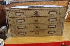 10" x 16" x 16" 4 drawer counter top cabinet with assorted bits ...