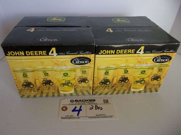 Two boxes of John Deere glasses - Backes Commercial Auctioneers