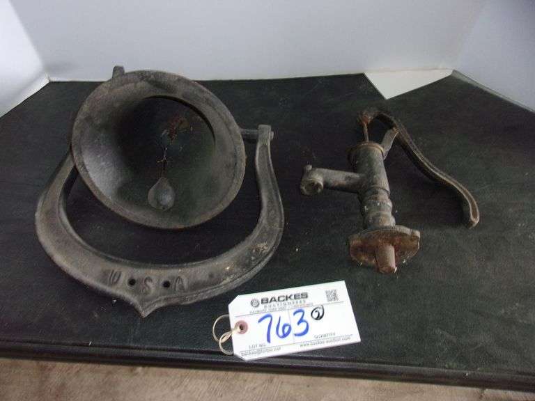 7" Iron bell and hydrant - Backes Commercial Auctioneers