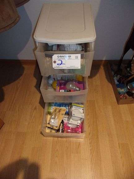 Storage container with light bulbs - Backes Commercial Auctioneers