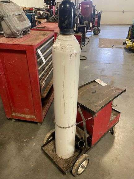 Argon tank with cap - tank is 42" tall - Backes Commercial Auctioneers