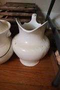Pair to go - water pitchers - Backes Commercial Auctioneers