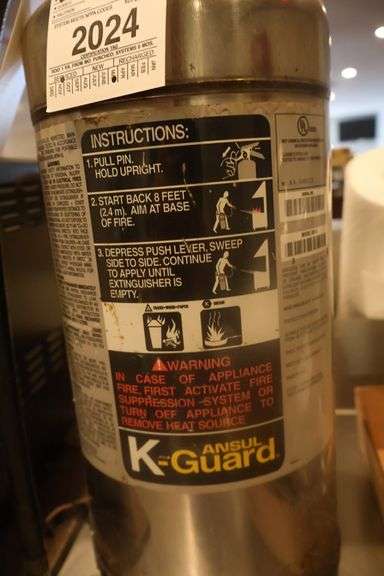 K-Guard type K fire extinguisher - Backes Commercial Auctioneers