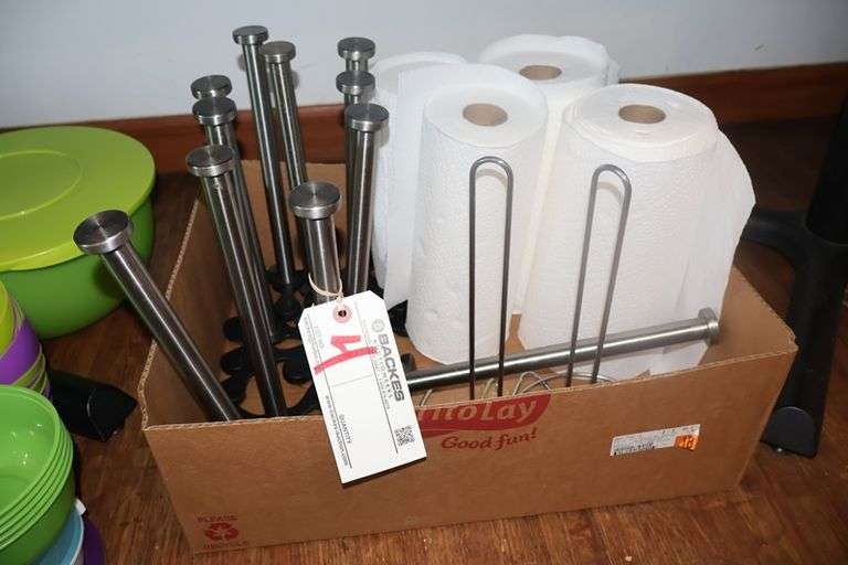 Box to go - Paper towel stands with some used rolls of paper towels ...