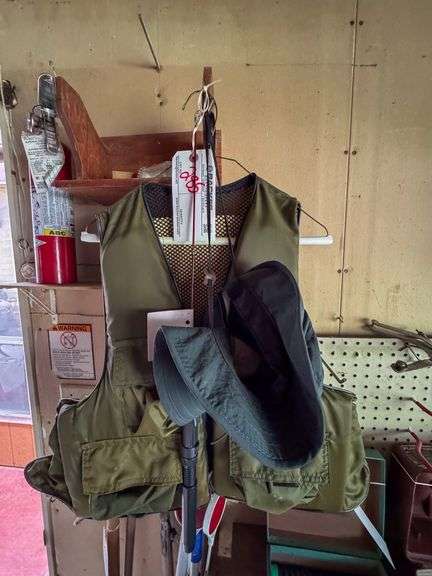 Life jacket, Ice pole, and hat - Backes Commercial Auctioneers