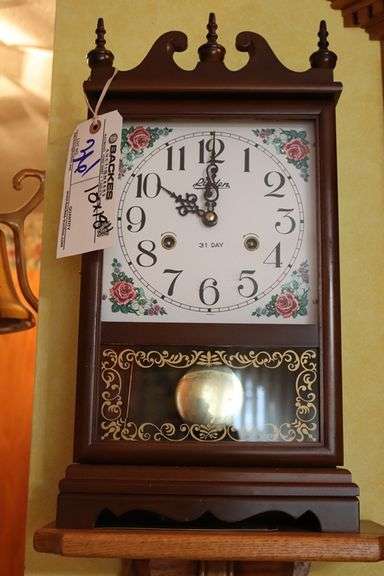 Linden 31 day wall mount clock - Backes Commercial Auctioneers