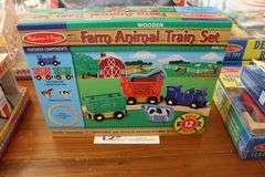 Melissa and Doug Farm Animal Train Set - Backes Commercial Auctioneers