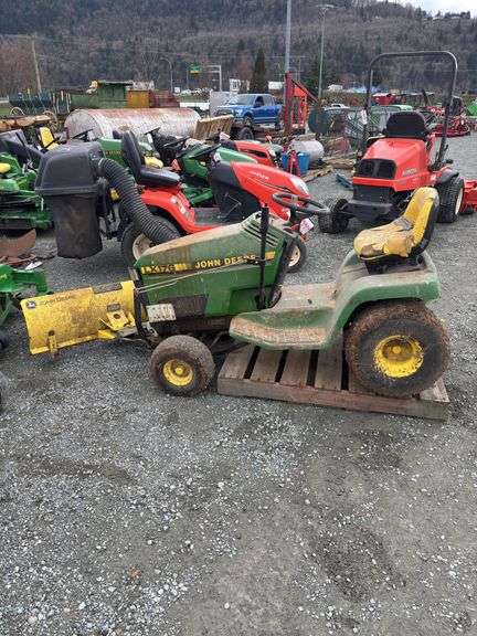 John Deere LX176 Feed Pusher Tractor - Beekman Auctions Ltd