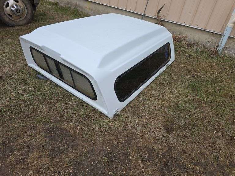 TOPPER OFF EARLY 2000'S FORD RANGER. - Freedom Auctions LLC