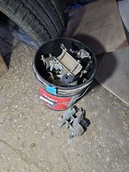 BUCKET FULL OF PIPE RACK STRAPS. - Freedom Auctions LLC