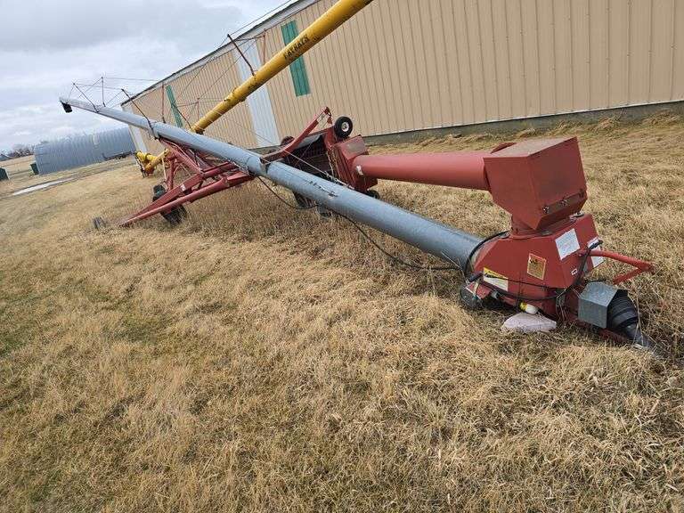 GALVANIZED AND RED AUGER. UNKNOWN CONDITION. - Freedom Auctions LLC