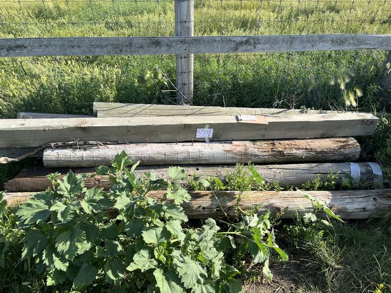 Wood post pile and rea poles - Hewitt Land Company