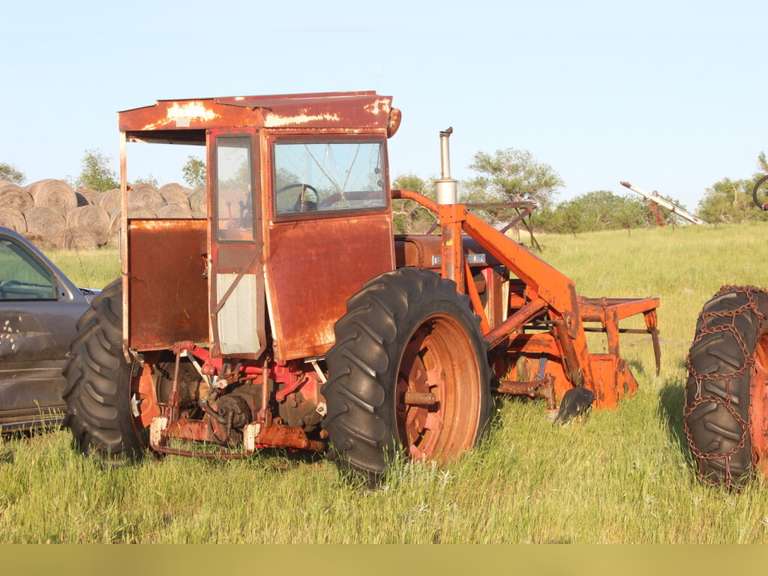 McCormick Farmall w/ Cab & Dual Loader - Hewitt Land Company