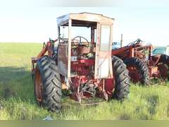 McCormick Farmall w/ Cab & Dual Loader - Hewitt Land Company