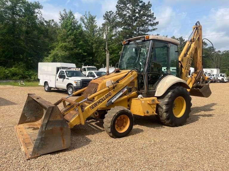 Ford 555-E 4WD Loader Backhoe - JJ Merchant