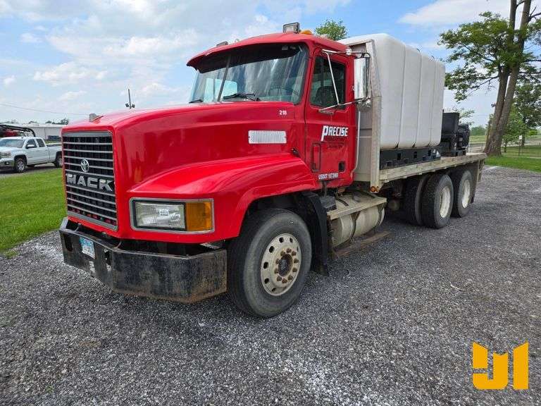 1999 MACK CH TANDEM AXLE REGULAR CAB FLATBED TRUCK VIN: 1M1AA13Y3XW107849 - Jeff Martin ...