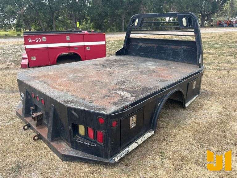 CM FLATBED 9’ UTILITY BODY - Jeff Martin Auctioneers, Inc.