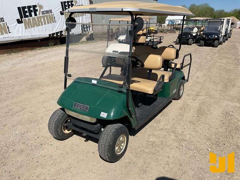 2010 EZ GO SHUTTLE GOLF CART 2698627 - Jeff Martin Auctioneers, Inc.