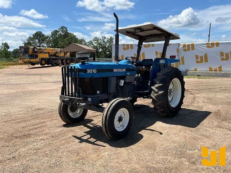 1999 NEW HOLLAND 3010 TRACTOR SN: 703480M - Jeff Martin Auctioneers, Inc.