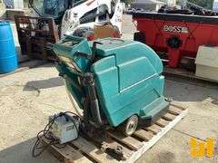 TENNANT MODEL 607528 FLOOR SCRUBBER - Jeff Martin Auctioneers, Inc.