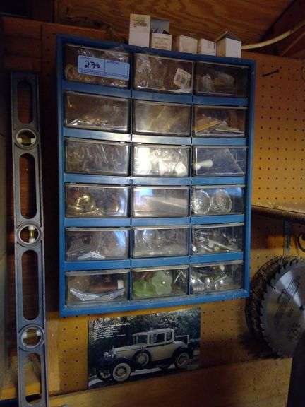 Plastic organizer with drawers filled with vintage drawer pulls - Land ...