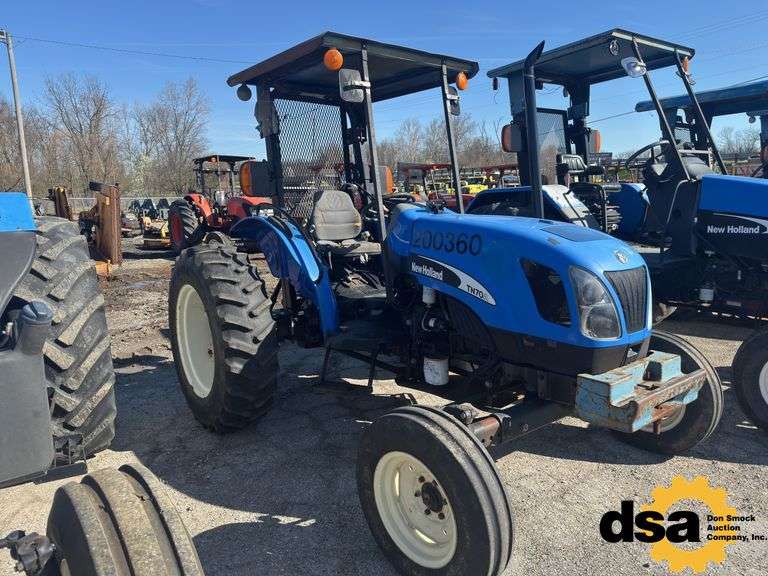 New Holland TN70A Ag Tractor - Don Smock Auction Company